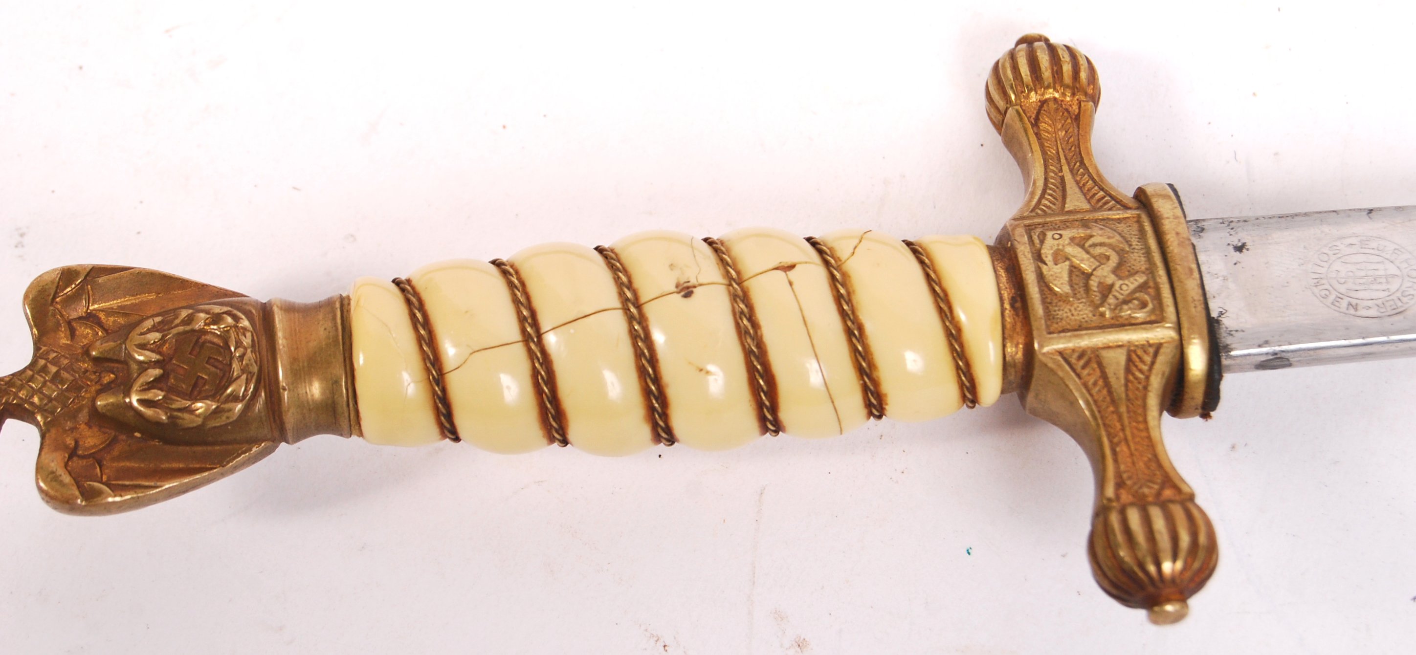 A WWII Second World War German Kriegsmarine Navy dagger. With engraved ...