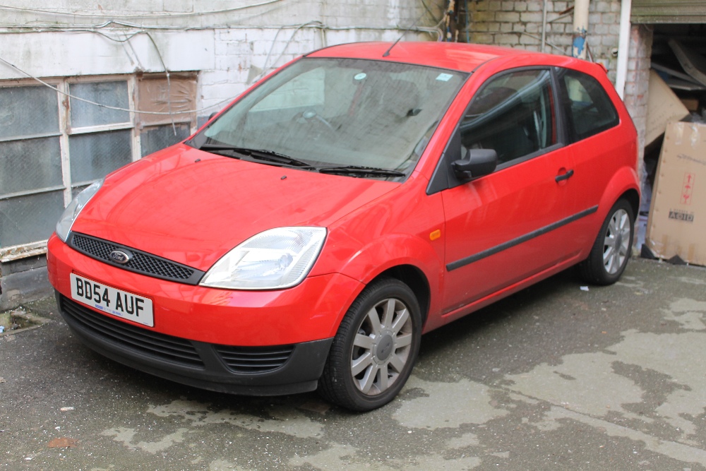 A RED FORD FIESTA FIREFLY 1.2 PETROL CAR. THREE DOORS, REG. BD54AUF ...