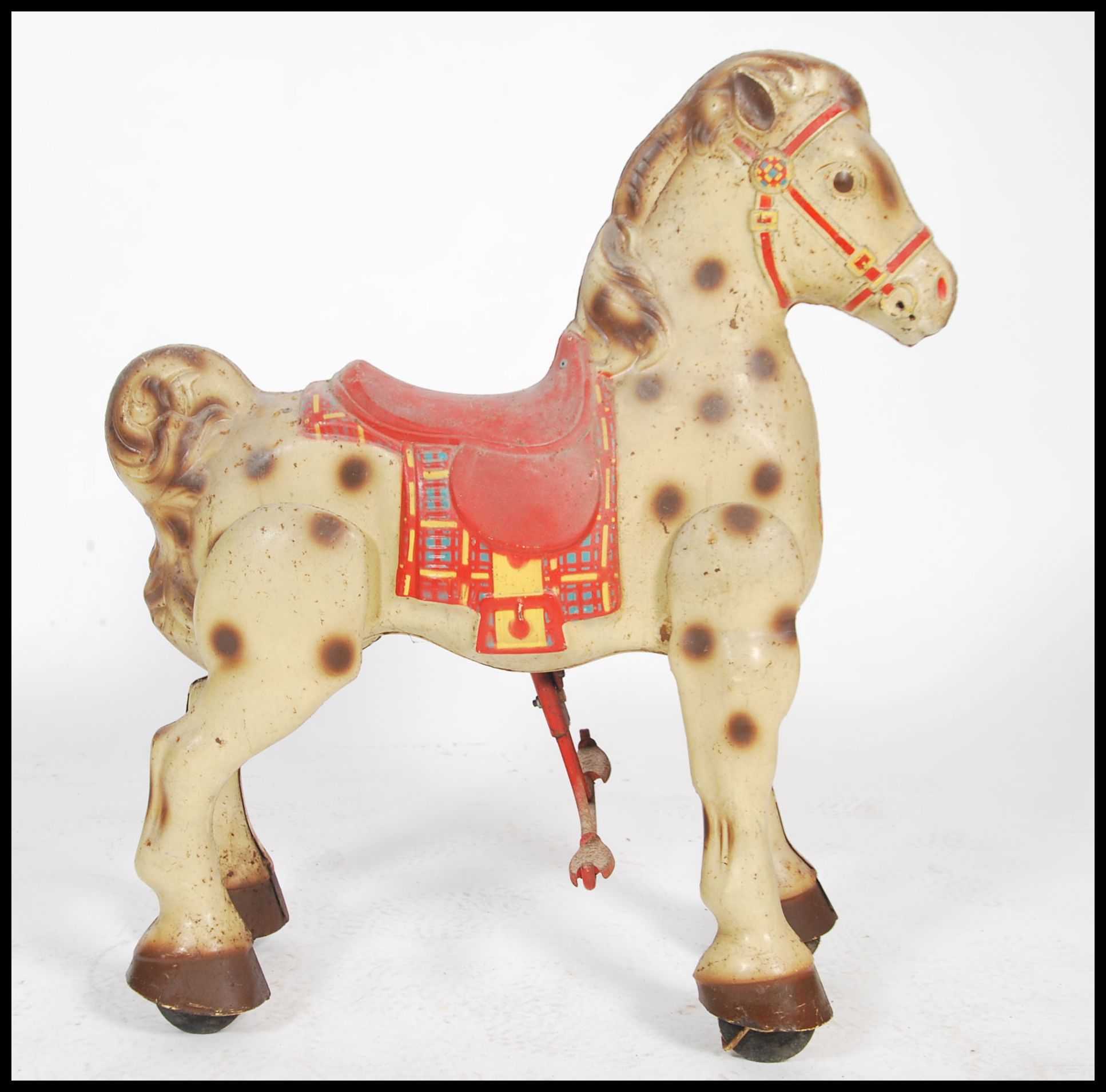 A vintage 20th century Mojo Bronco children's tin plate pedal car type ...