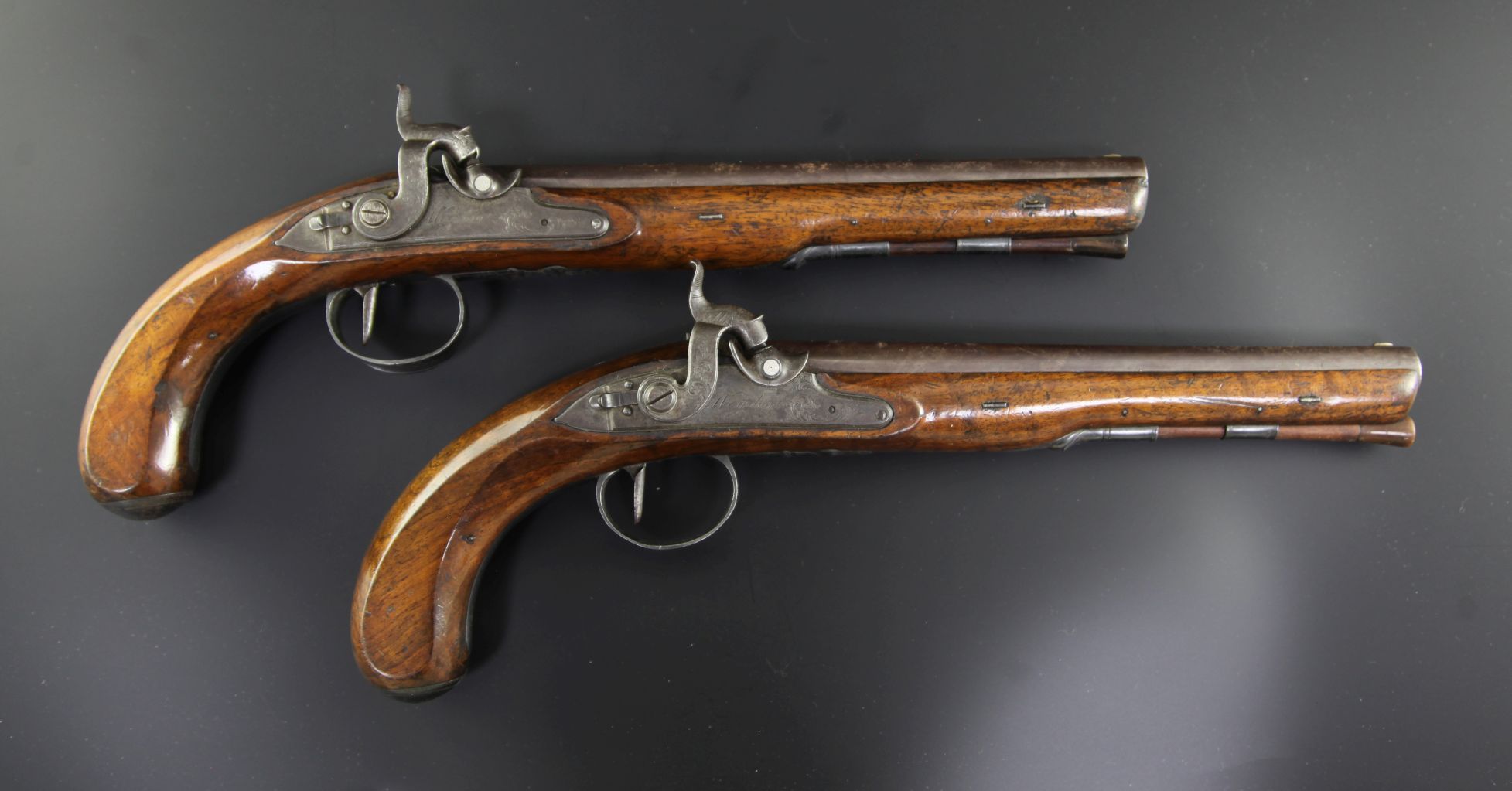 A pair of early 19th century percussion lock pistols, by Wogdon of ...