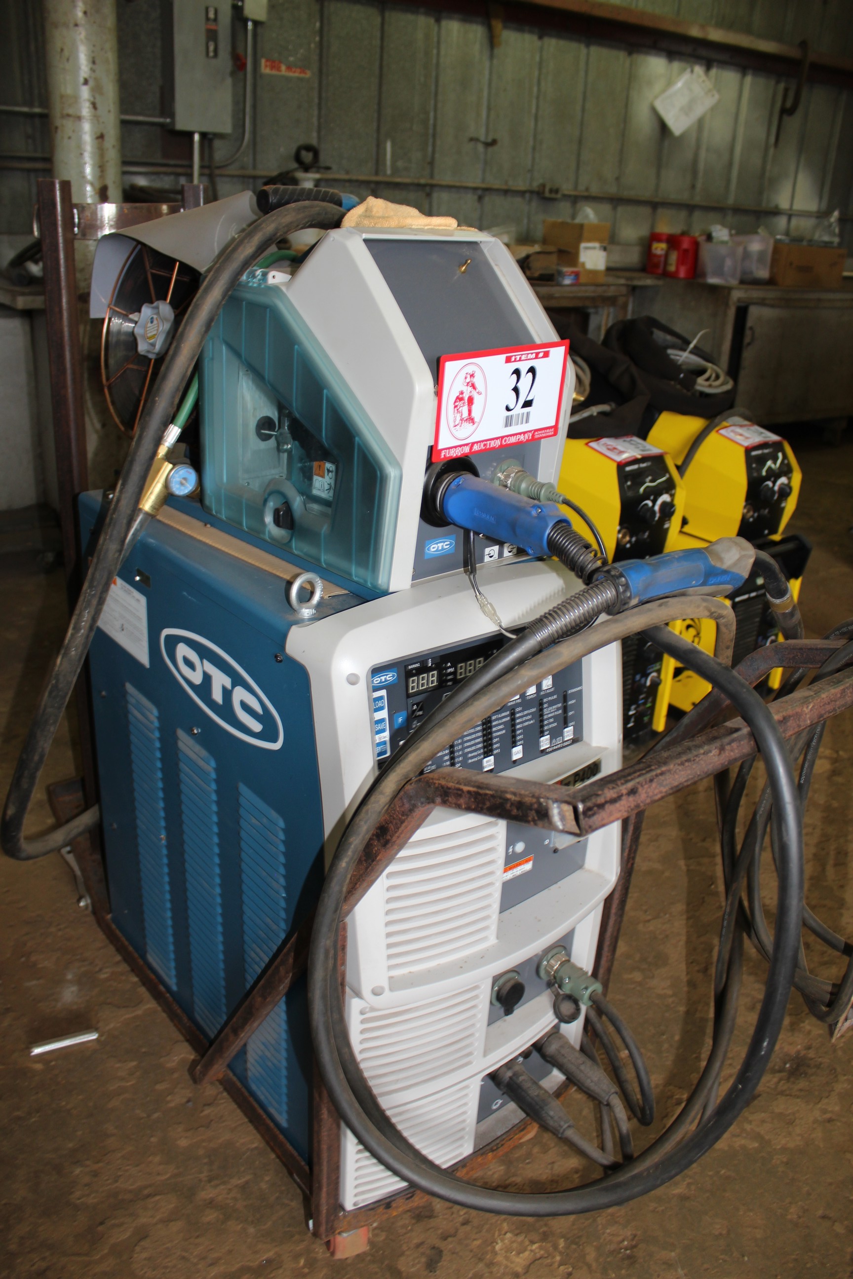 { Choice of lots: 31, 32 } OTC Welbee P400 Welder w/ OTC Model CM-743-U Wire Feed, Manufactured