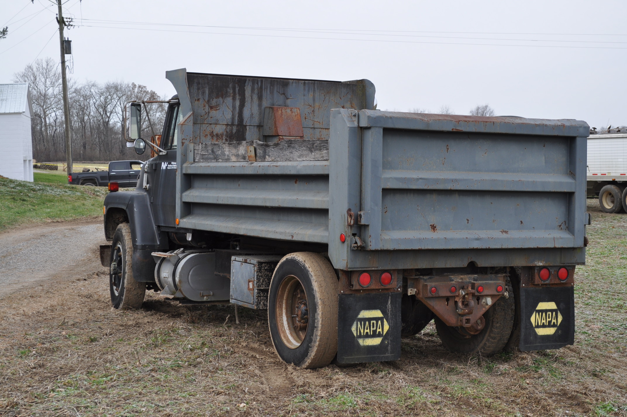 1981 Ford L9000 single axle dump truck, spring ride, 285/75 R 24.5 tires, NTC-240 Cummins, 12’ st