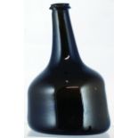 ENGLISH ONION WINE BOTTLE. 6.25ins tall, dark olive glass, applied ...