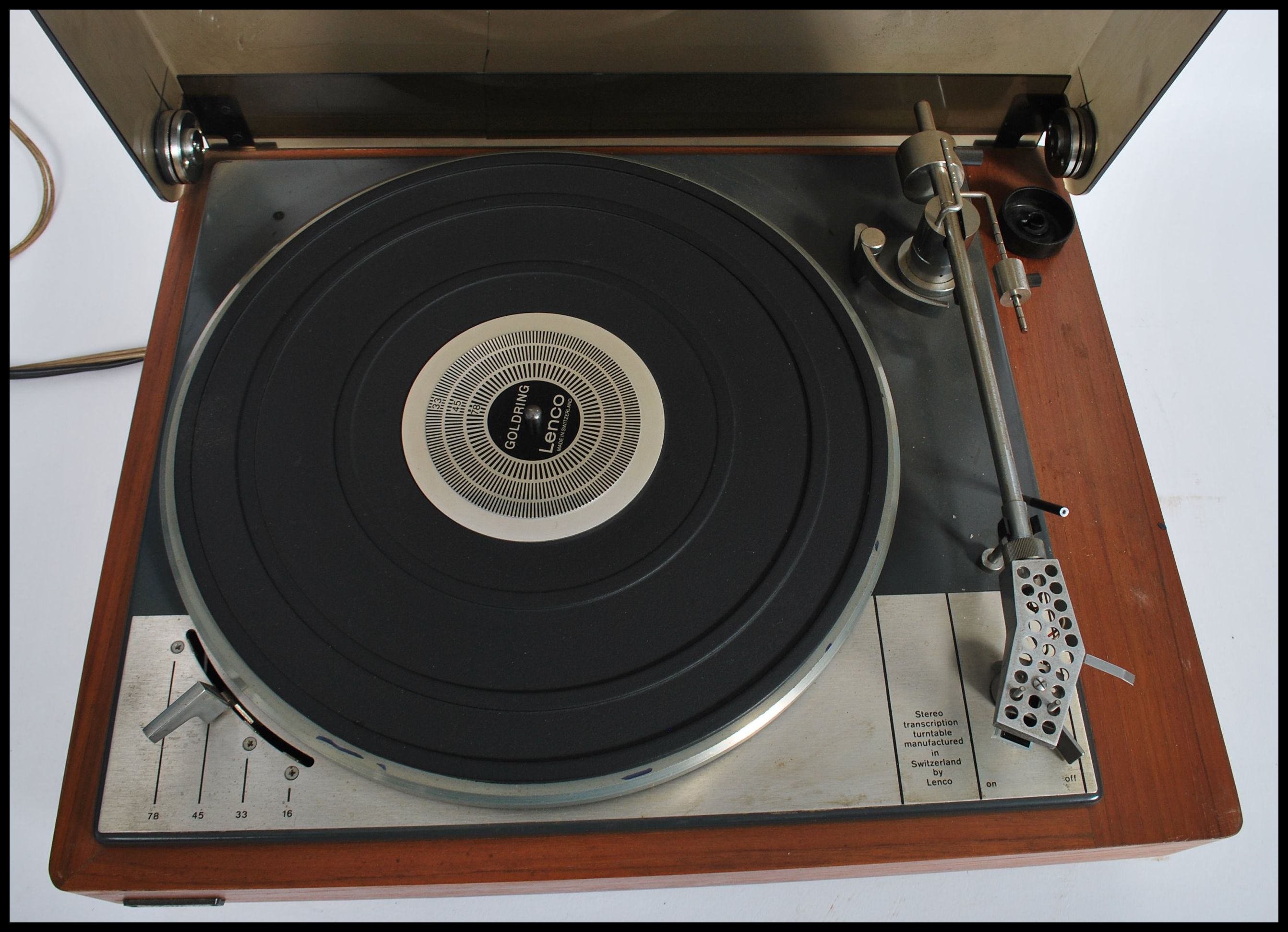 A vintage 20th century Lenco Goldring record player deck set within a ...