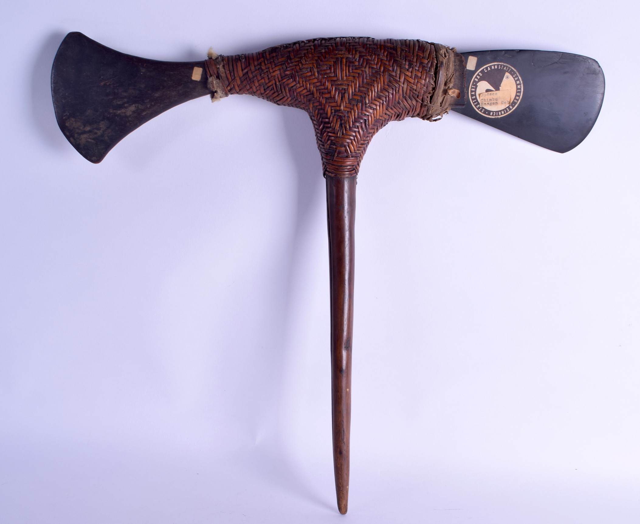 AN AFRICAN TRIBAL CARVED WOOD AND STONE DOUBLE HEADED AXE with wicker ...