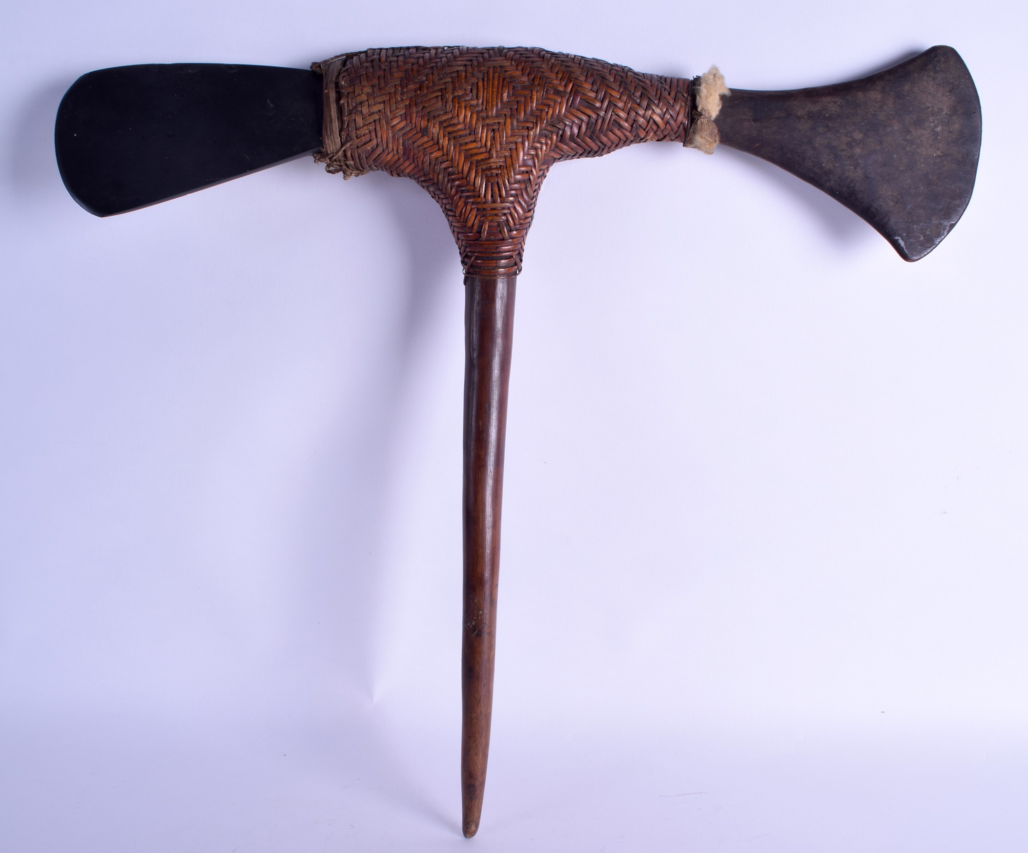 AN AFRICAN TRIBAL CARVED WOOD AND STONE DOUBLE HEADED AXE with wicker ...