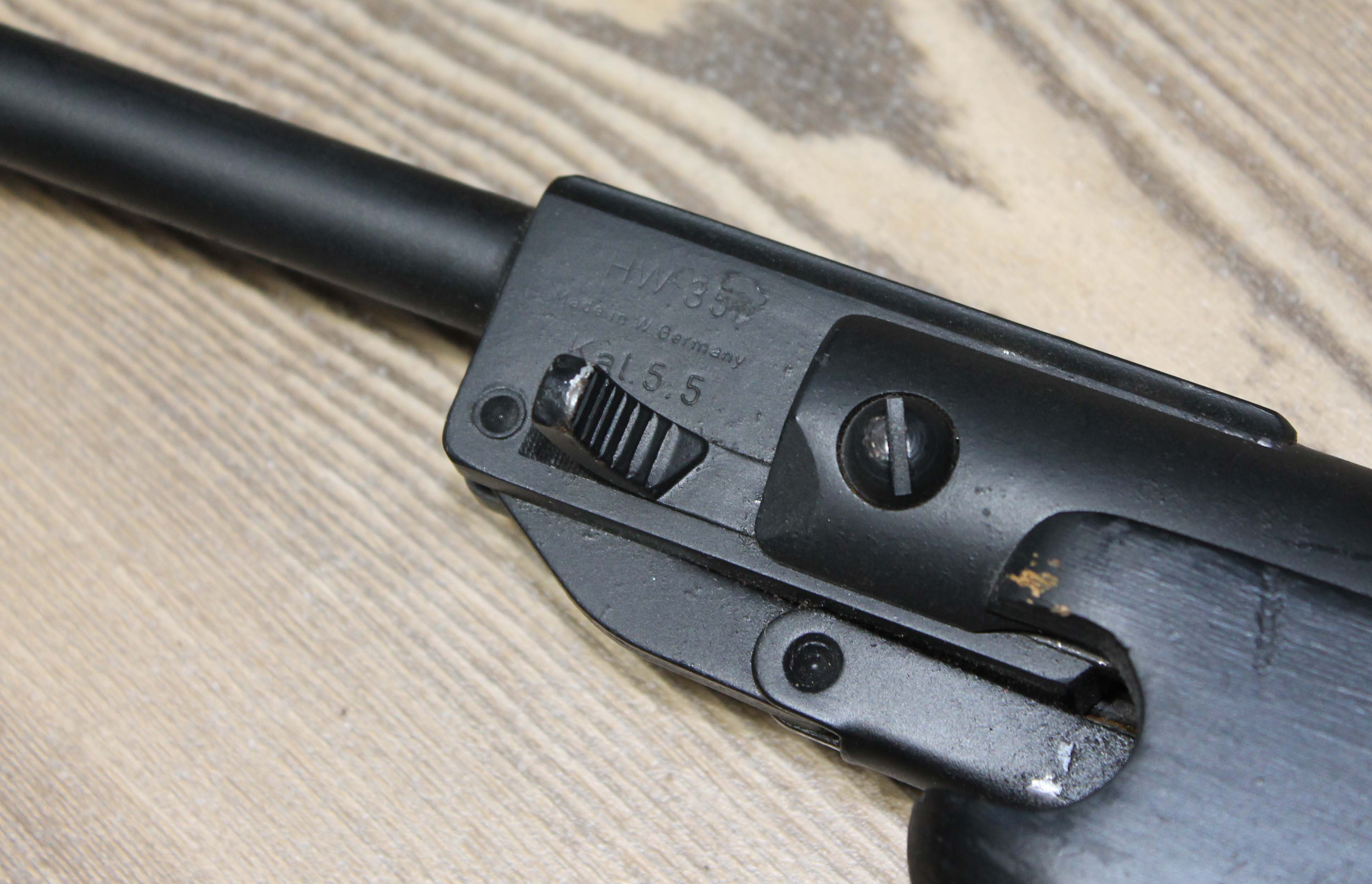 A Weihrauch HW80 air rifle with scope, length 115cm.