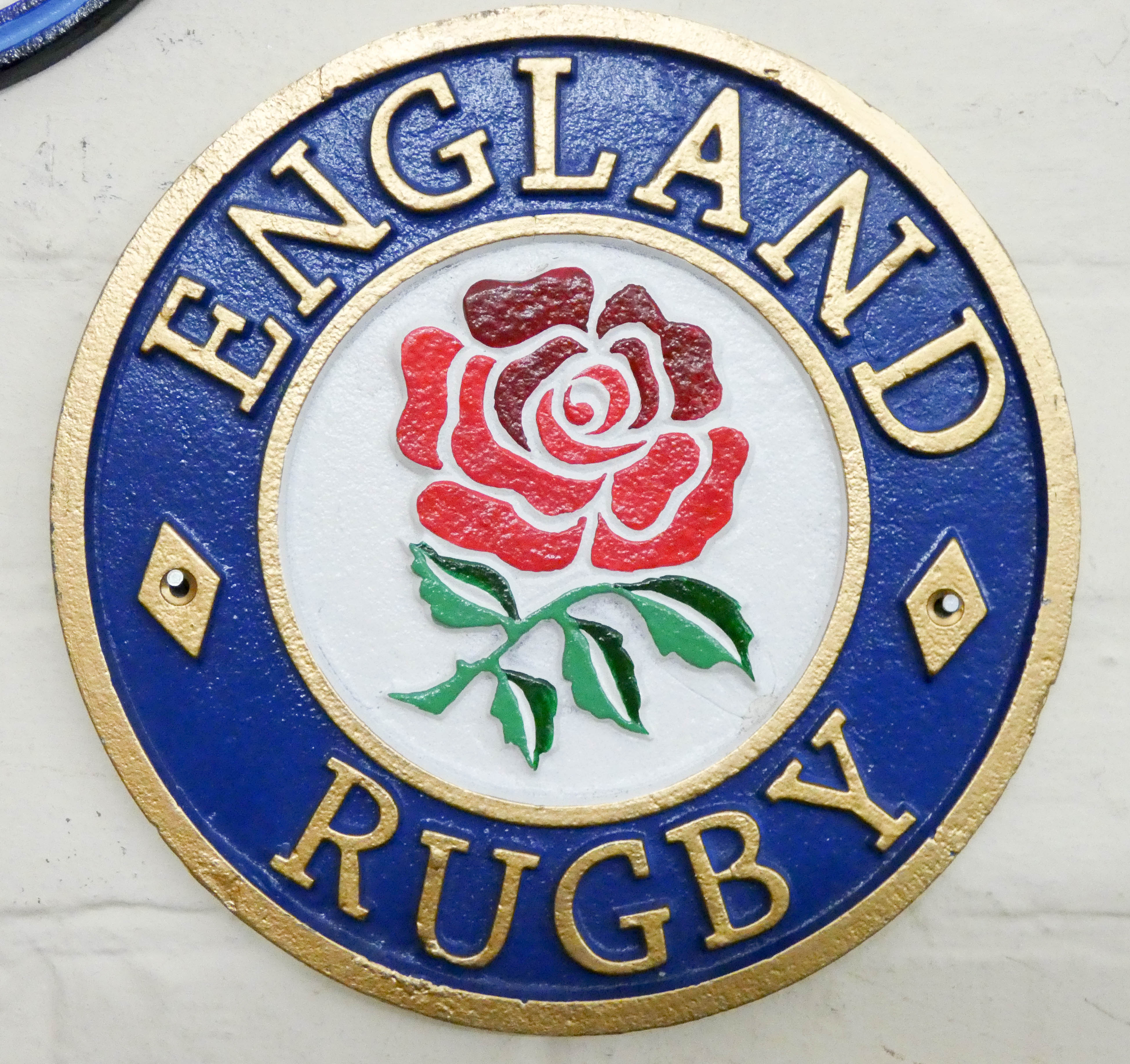 A cast iron England Rugby wall hanging plaque