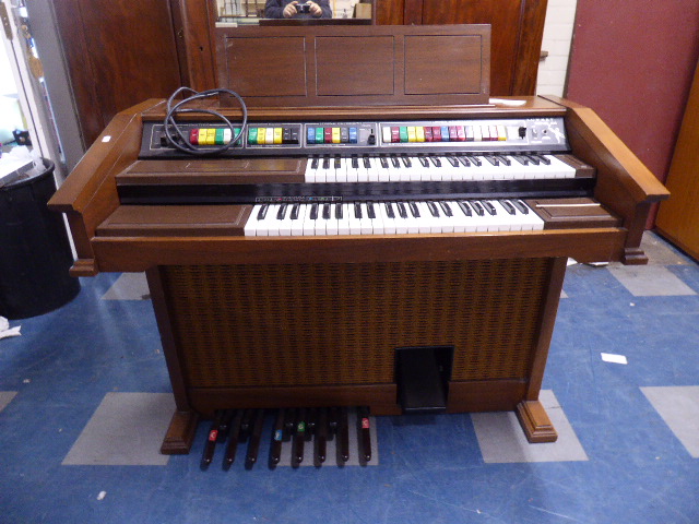 A 1970's Lowrey Genie 44 Electric Organ, 117cm Wide