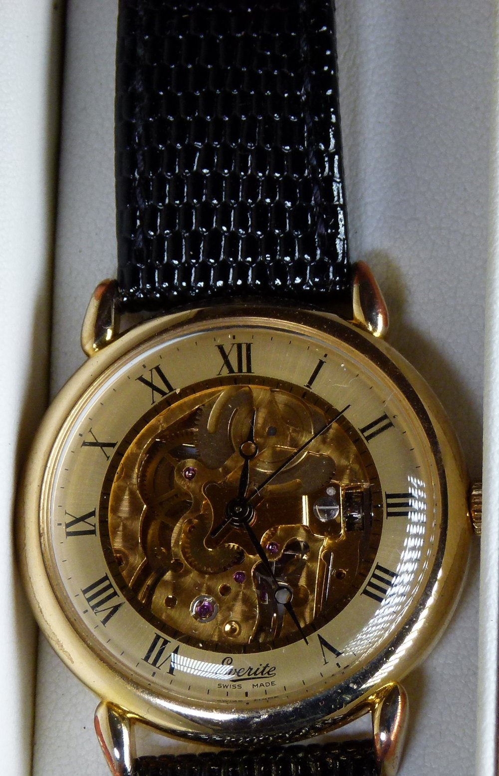 EVERITE MECHANICAL SKELETON WATCH. Gold plated Everite mechanical ...