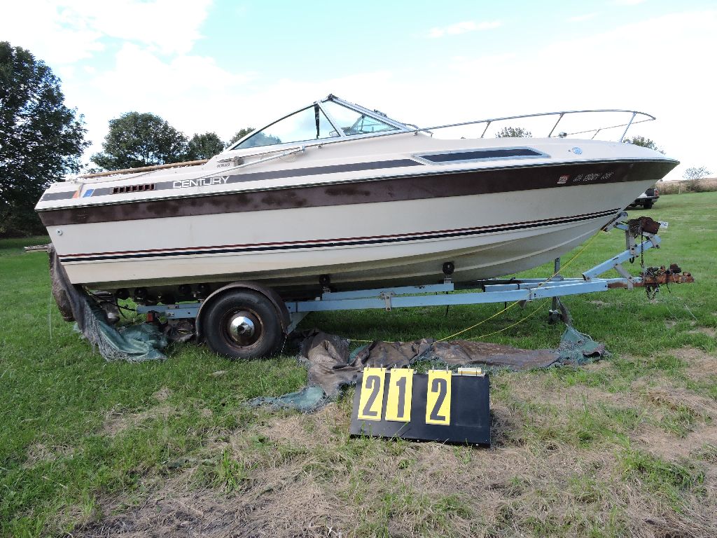 Century 4000 boat, 20', Mercury Cruiser motor, Easy Load trailer.