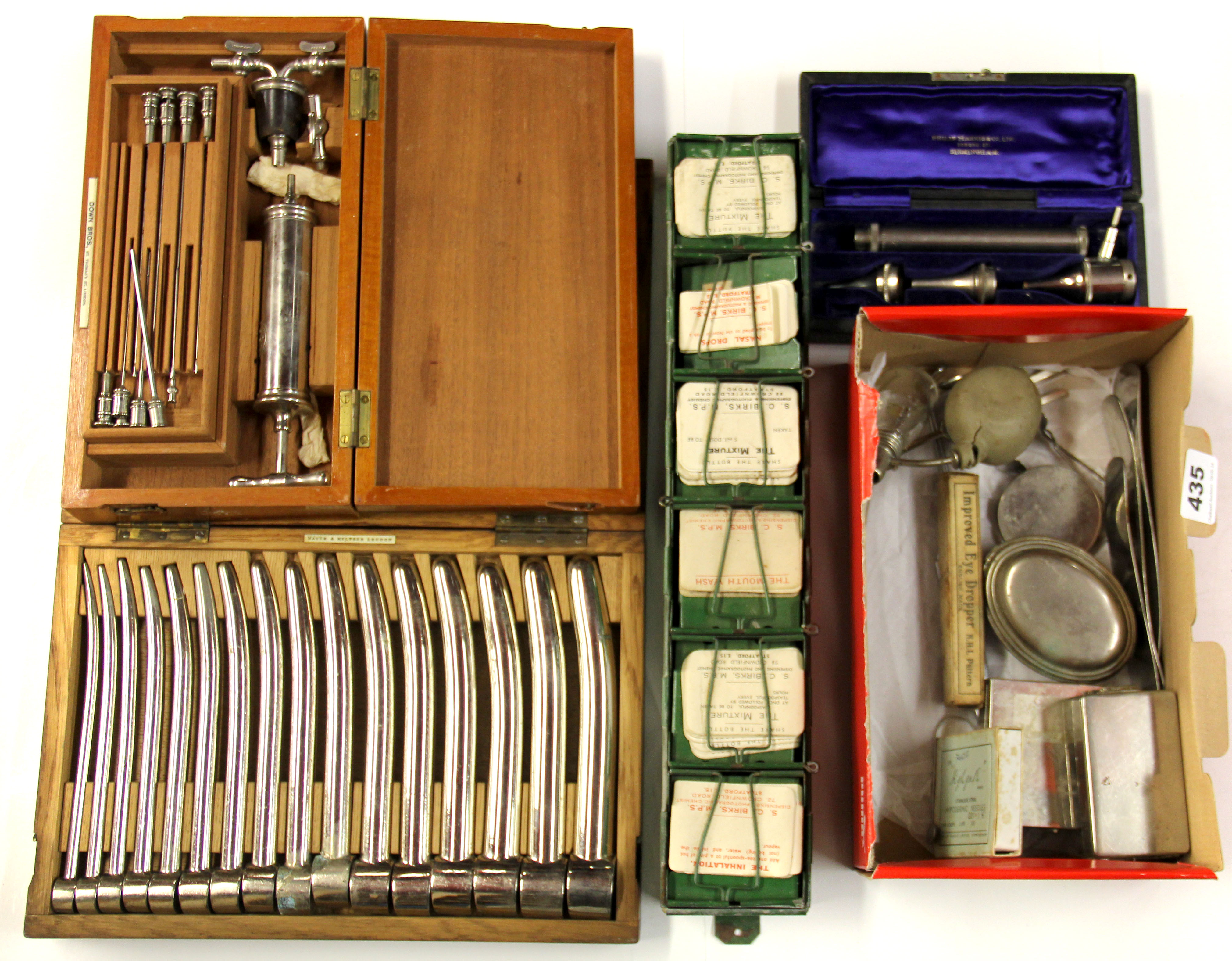 A quantity of vintage medical and pharmacy equipment.