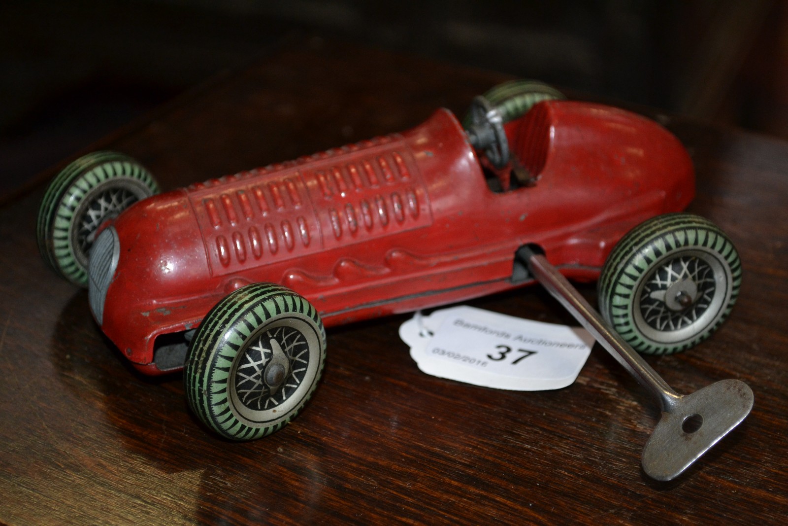 Toys - a tinplate racing car by Mettoy
