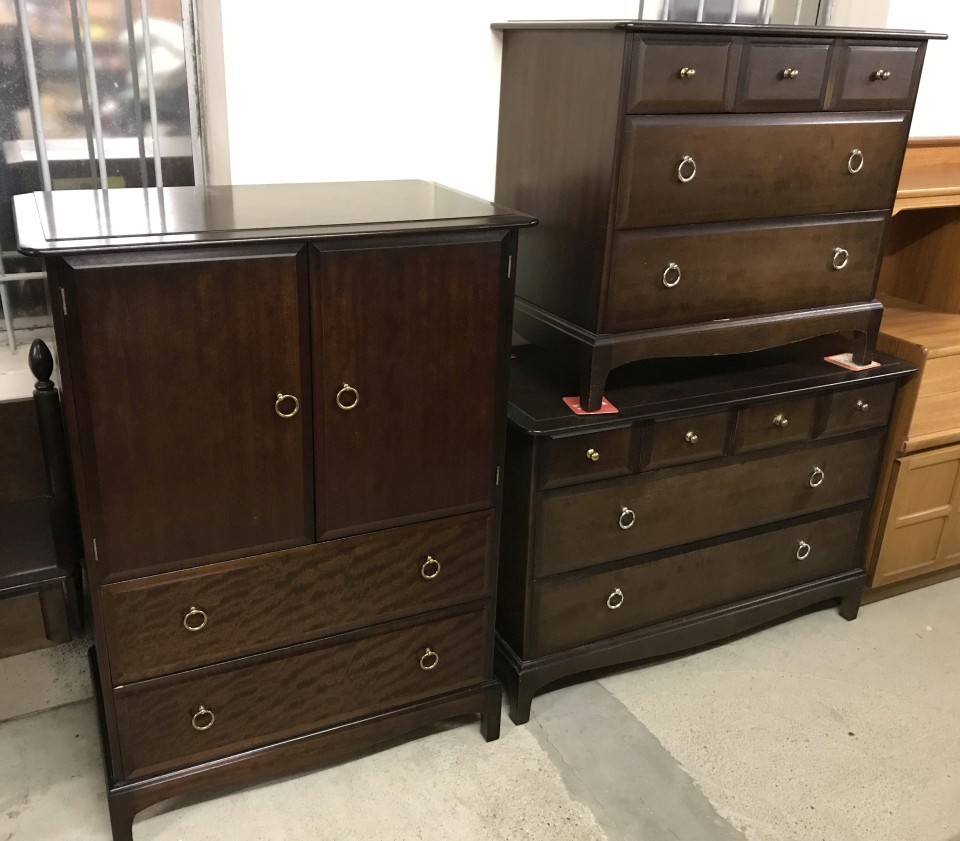 A dark wood Stag bedroom furniture suite. Comprising: Headboard with ...