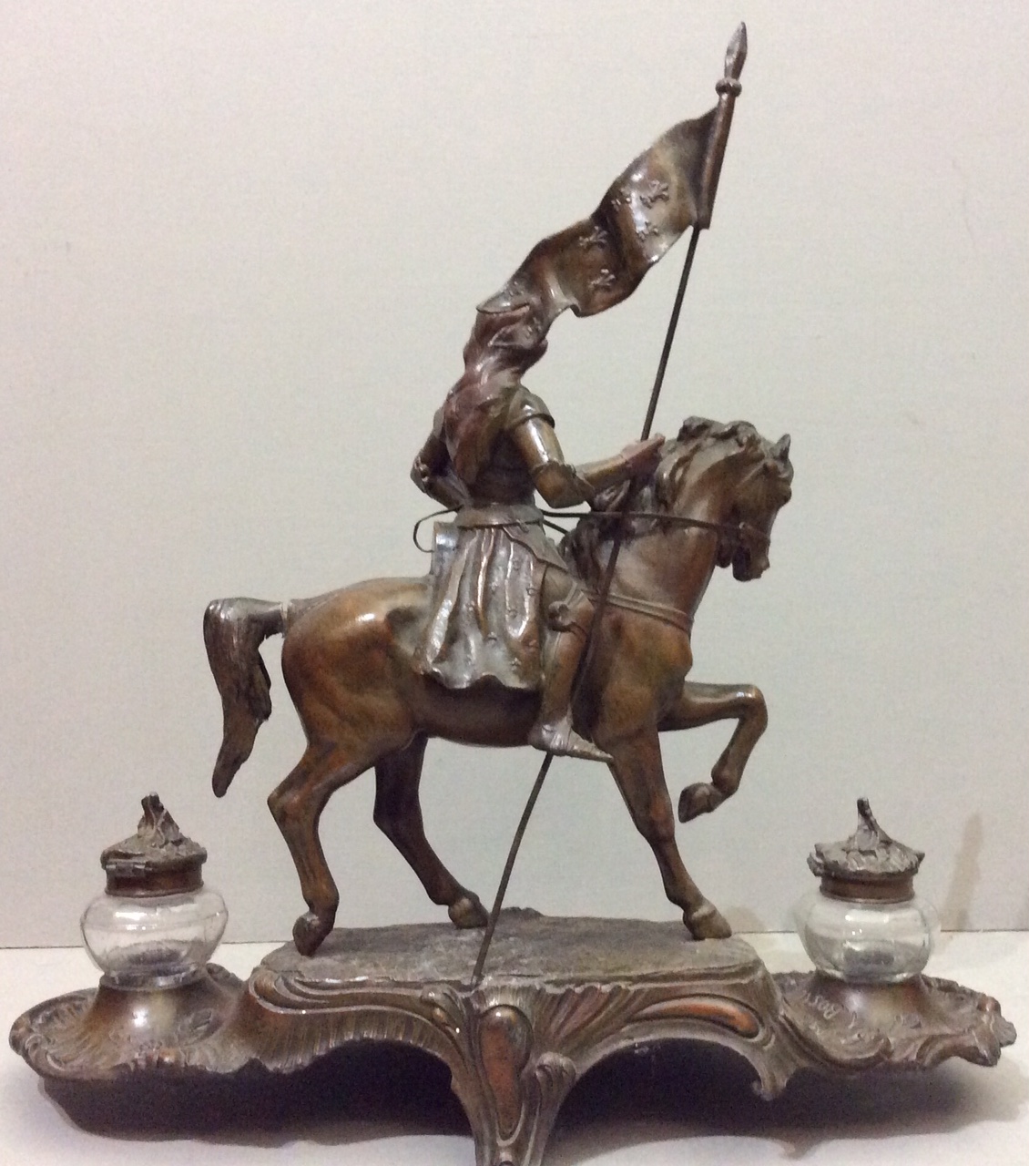 AUGUSTE BOSSU, FRENCH, A 19TH CENTURY SPELTER FIGURAL INKWELL Having a ...