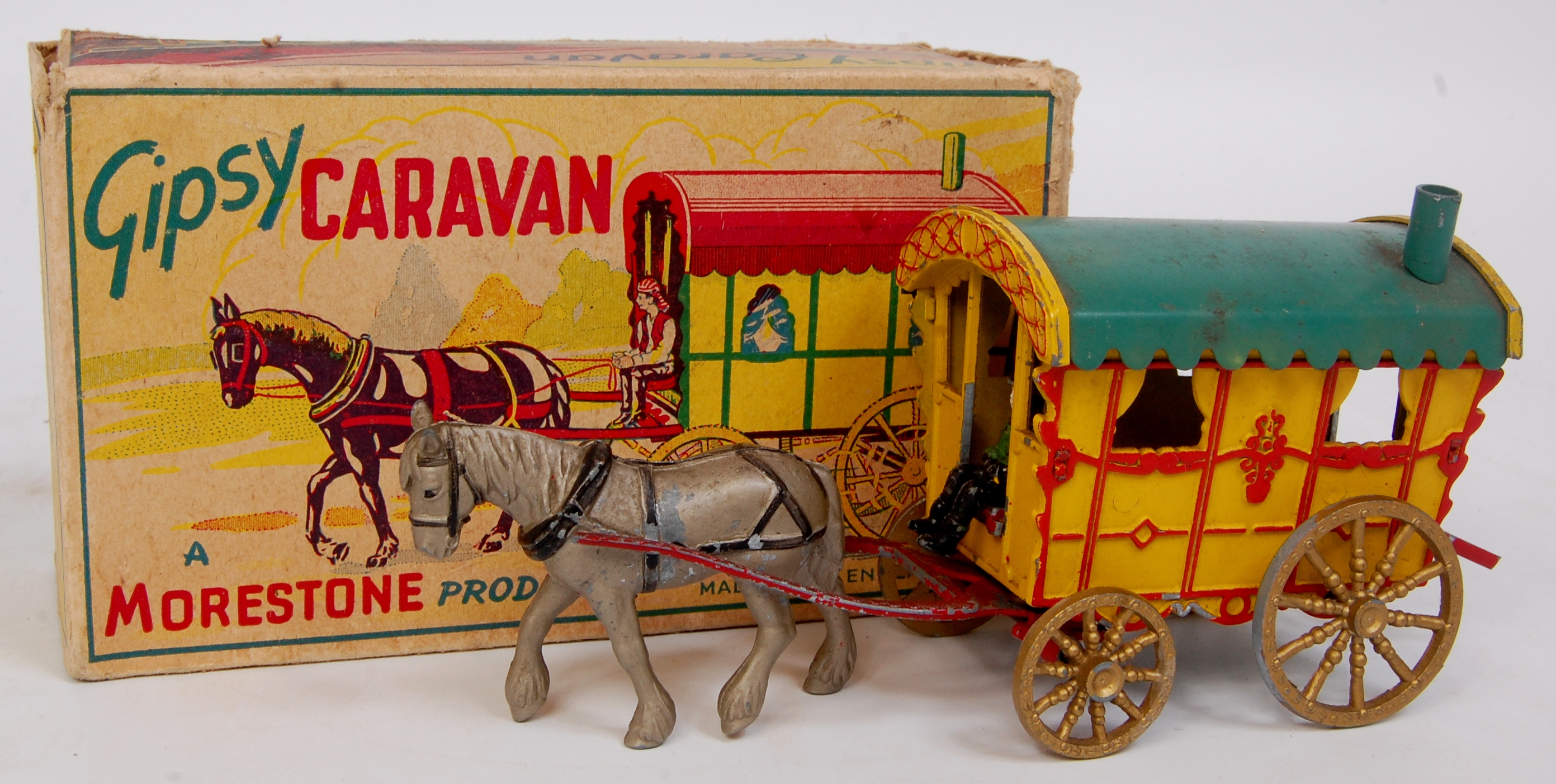 Morestone Gypsy Caravan, comprising of yellow caravan with green roof ...