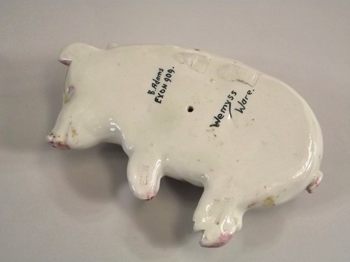 WEMYSS PIG. An Exon Pottery Wemyss Ware sleeping pig by Brian Adams ...