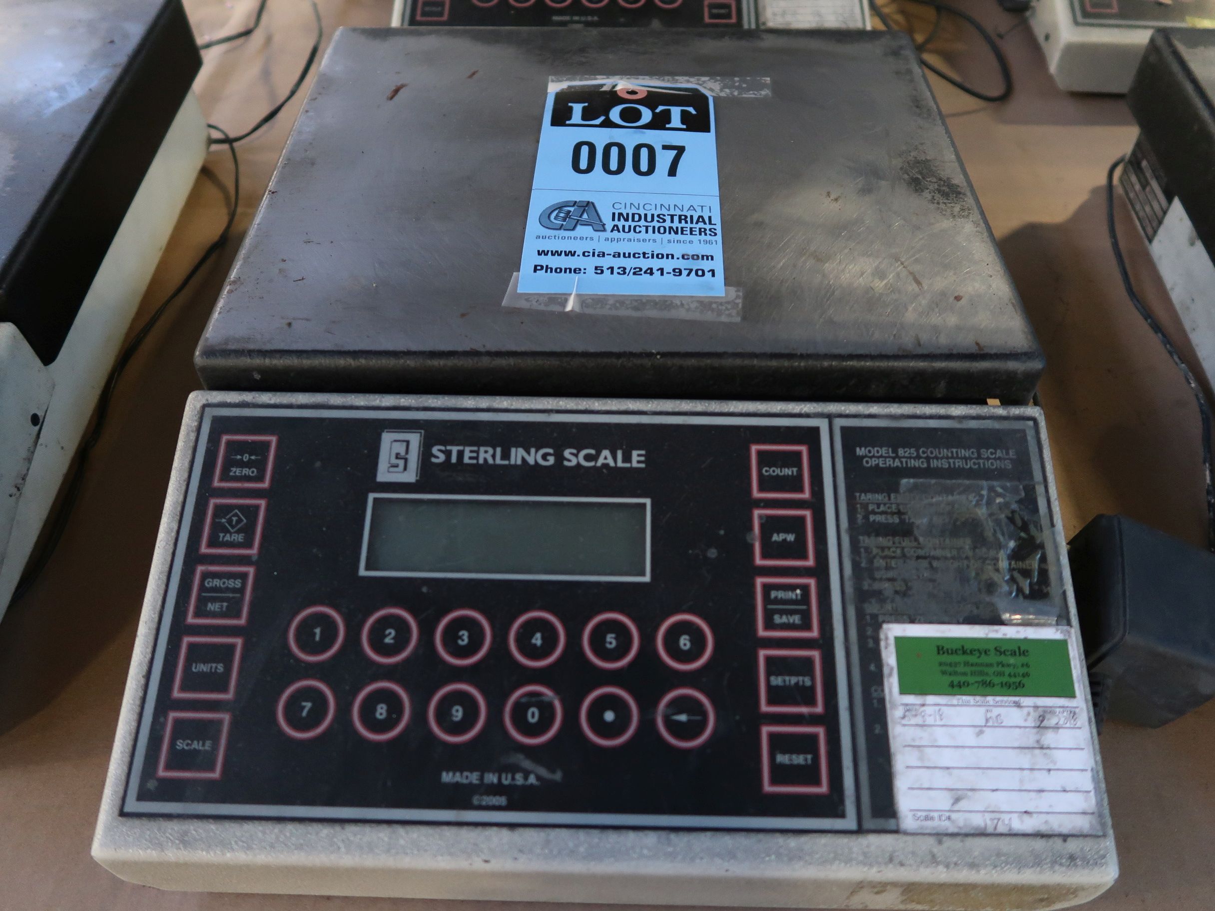 { Group of lots: 7, 8, 9, 10 } 50 LB. STERLING MODEL 825 DIGITAL SCALE