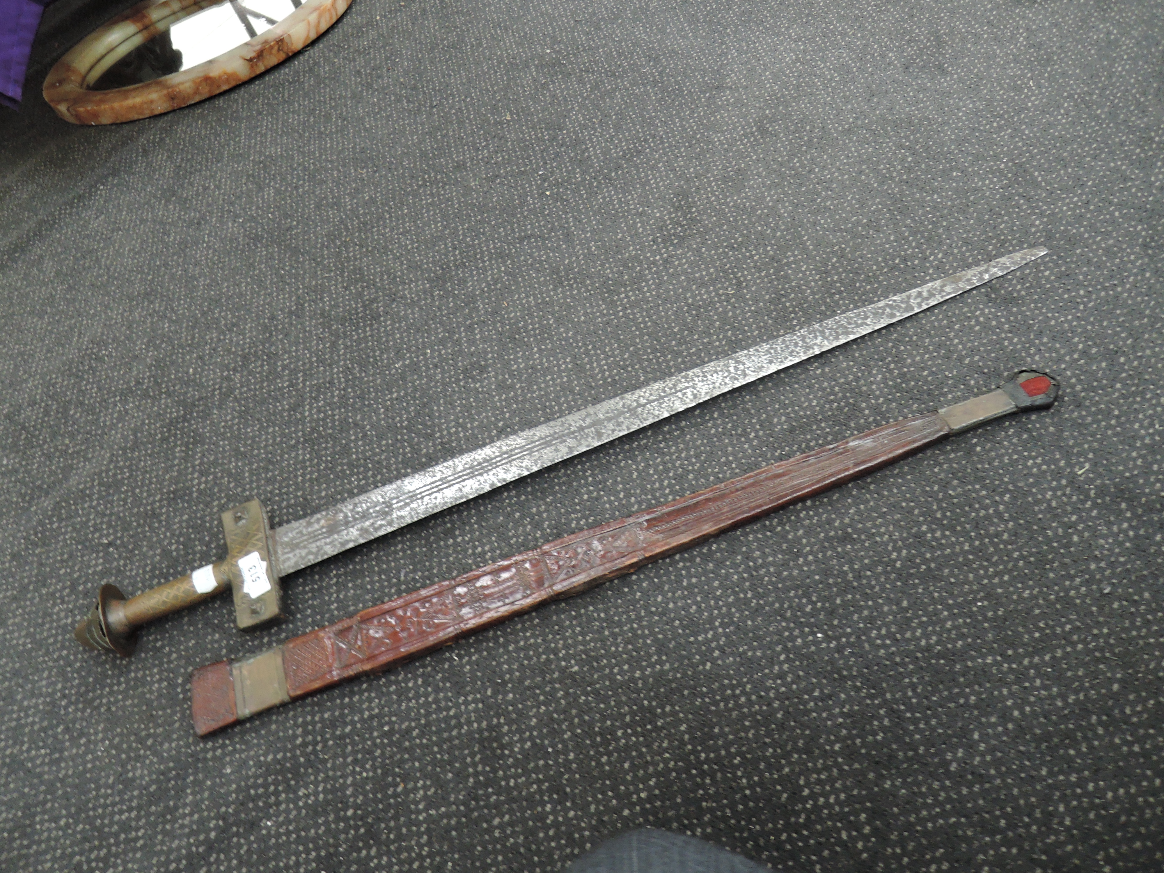 A Nigerian Hausa people sword possibly a Takouba type C1880 with ...