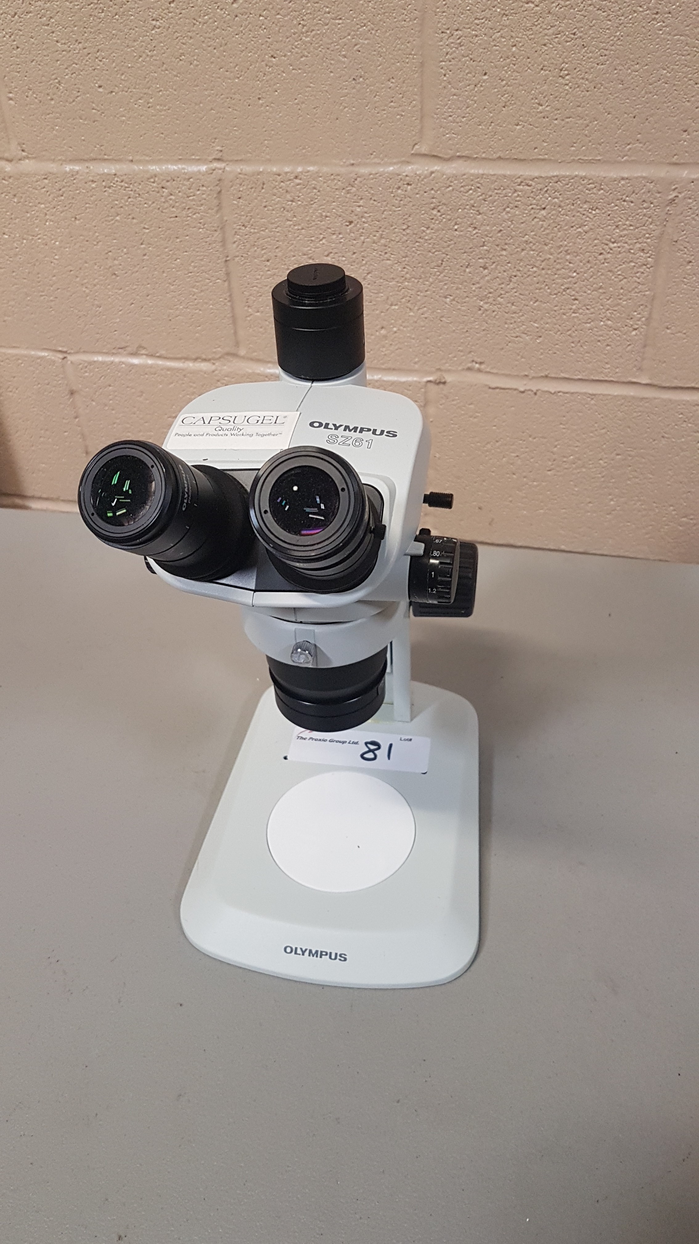 Olympus bifocal microscope, model SZ61.