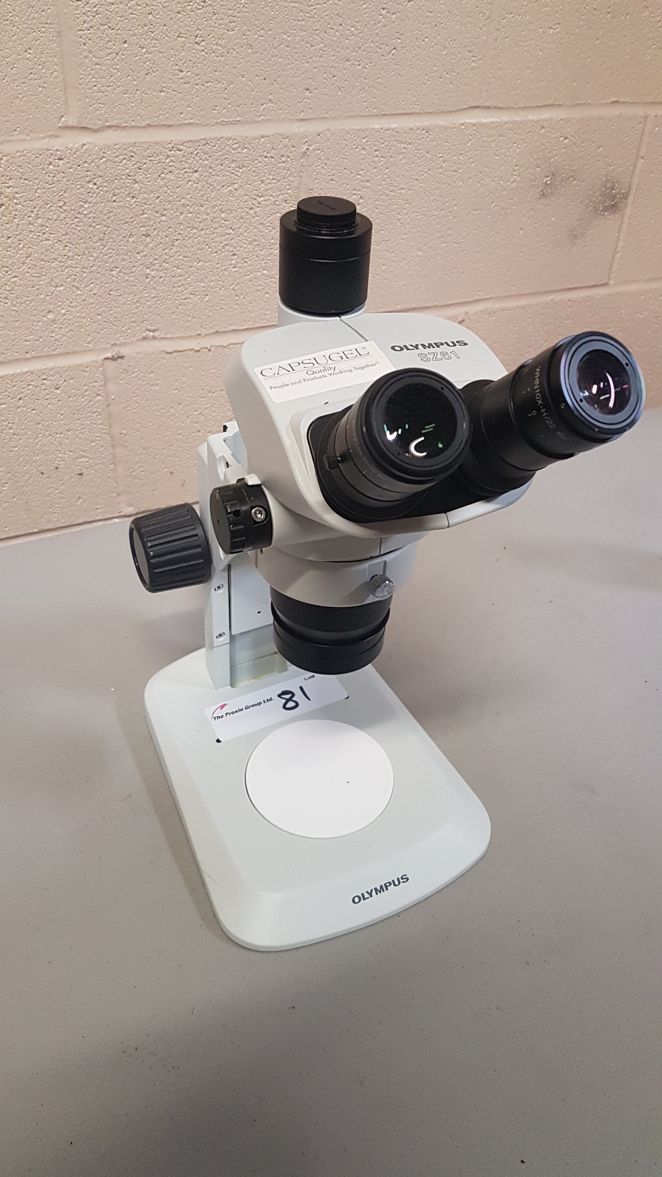 Olympus bifocal microscope, model SZ61.