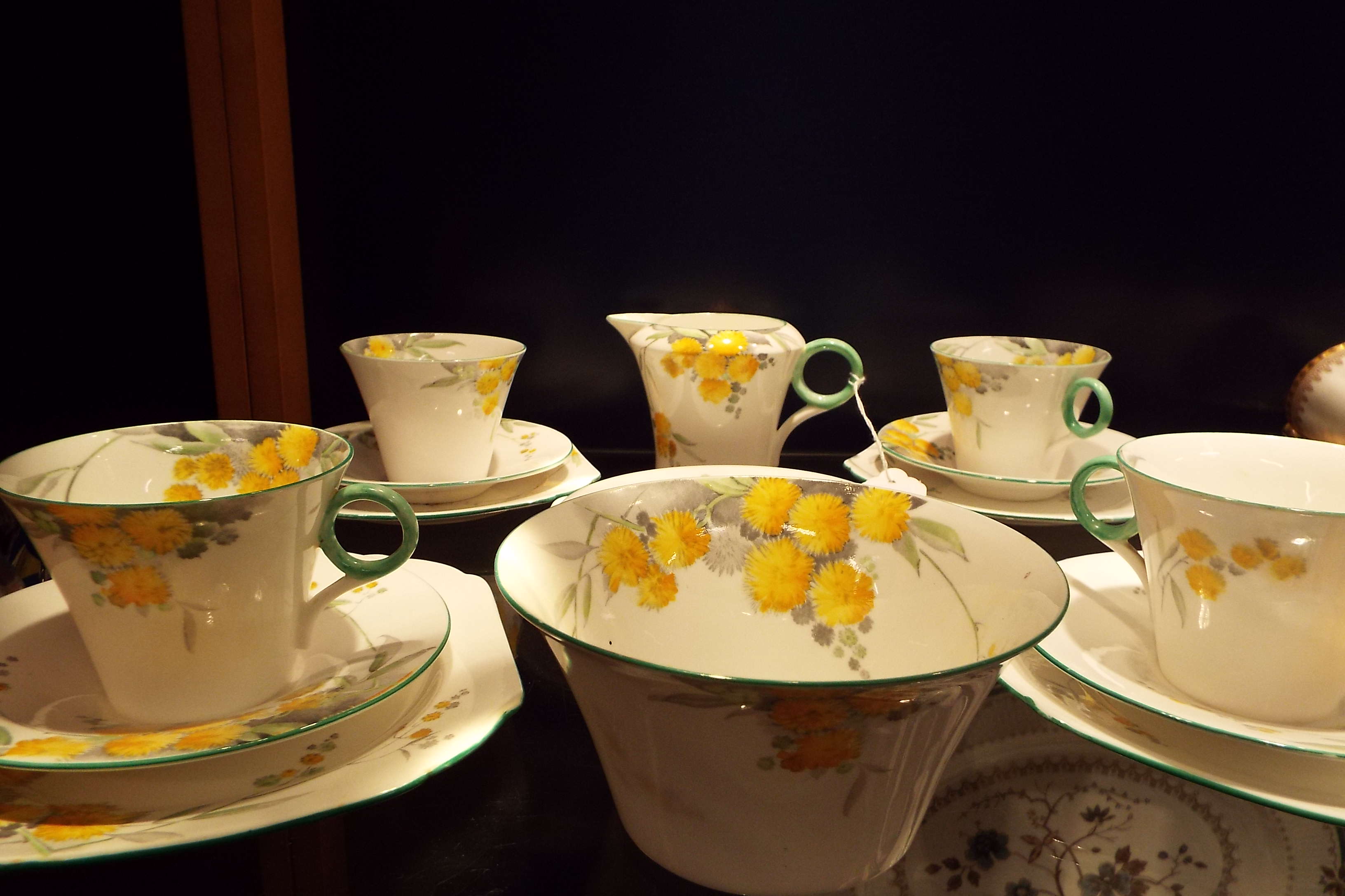 A Shelley 12204 'Regent Acacia' part tea set having four cups and ...