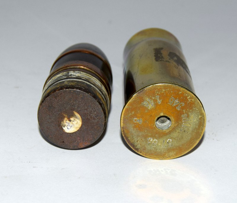 A complete inert WW1 German artillery shell 16cms x 4.5cms with two WW1 ...