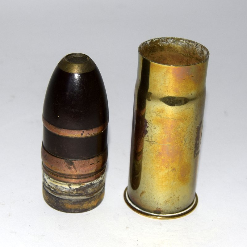 A complete inert WW1 German artillery shell 16cms x 4.5cms with two WW1 ...