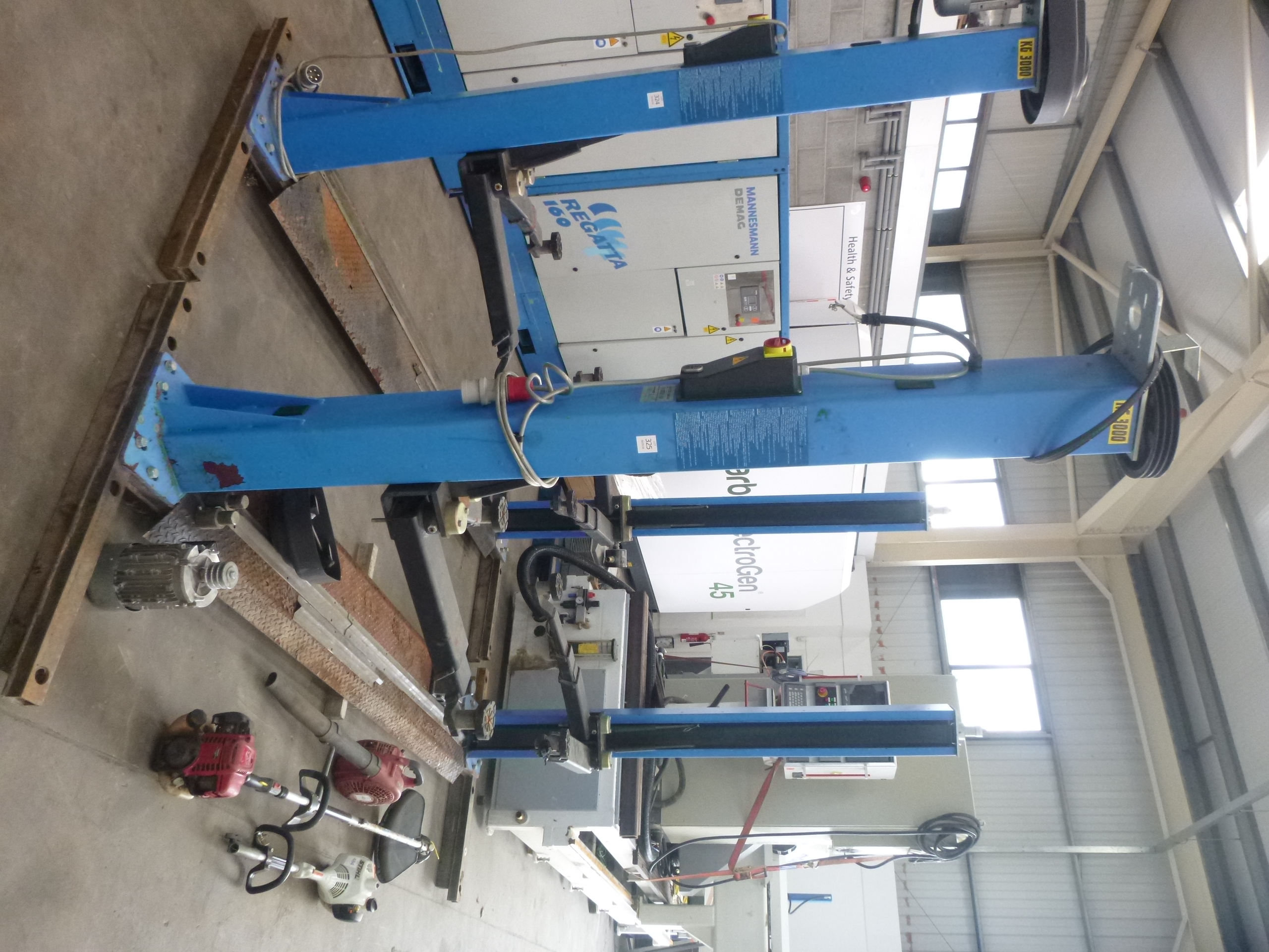 * A Hofmann 3000Kg 2 Post Lift EML3000 s/n 603575 3PH. Please note ...