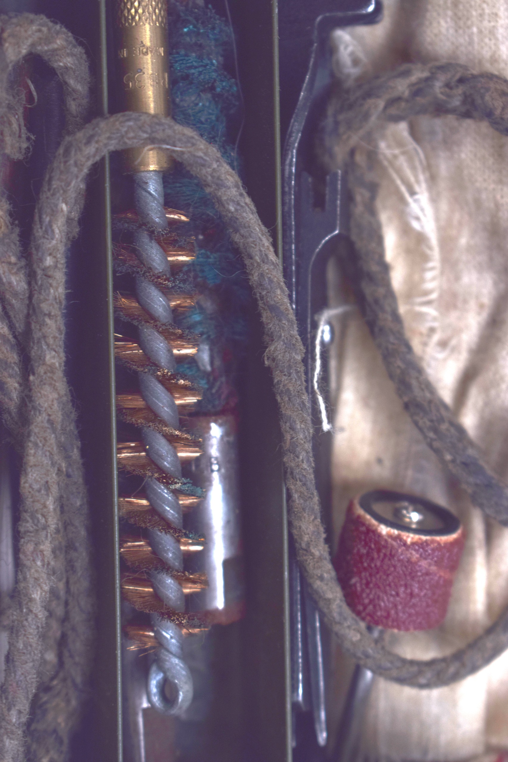 A VINTAGE GUN CLEANING KIT.