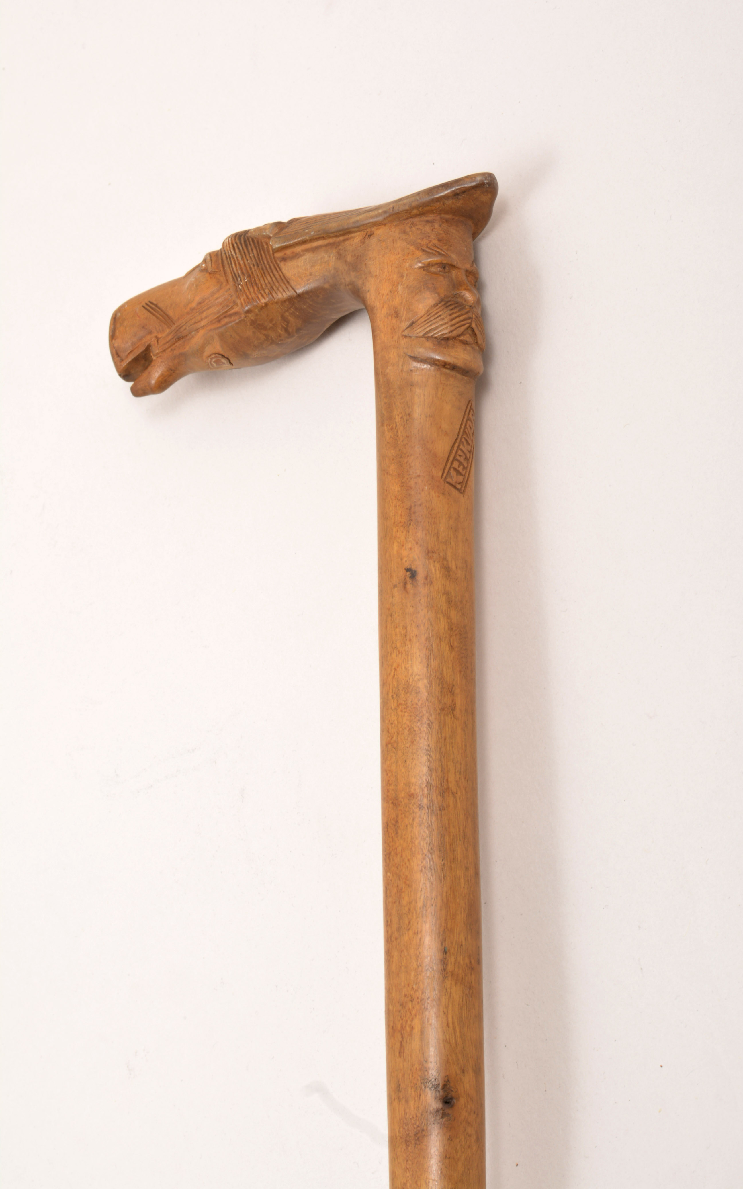 A Greek carved wood walking stick, Corfu, circa 1900, horse head design ...