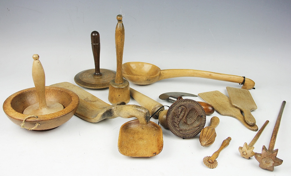 A collection of 19th century and later carved light wood kitchen ...