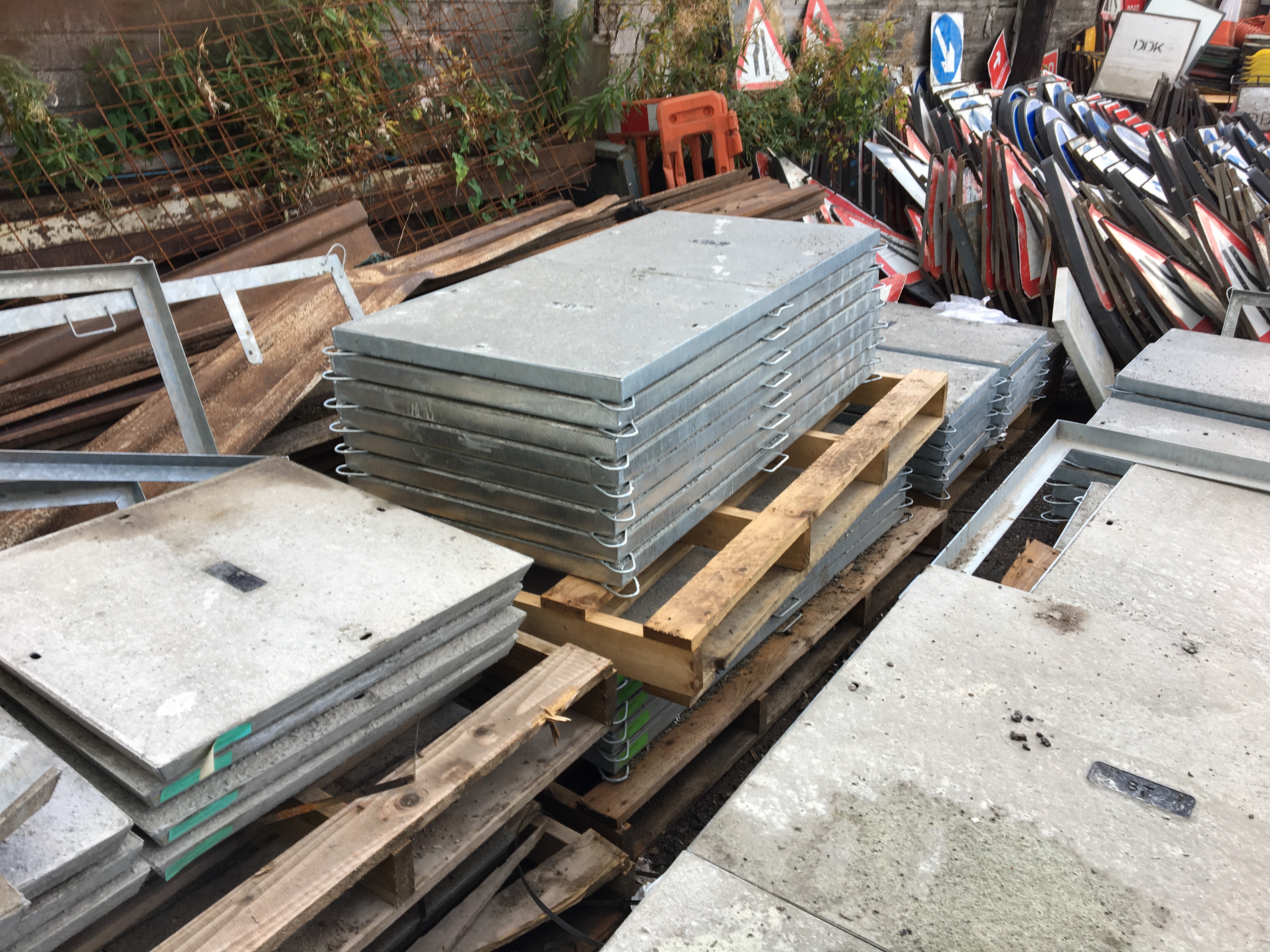 Quantity of concrete infill manhole covers (marked BT)