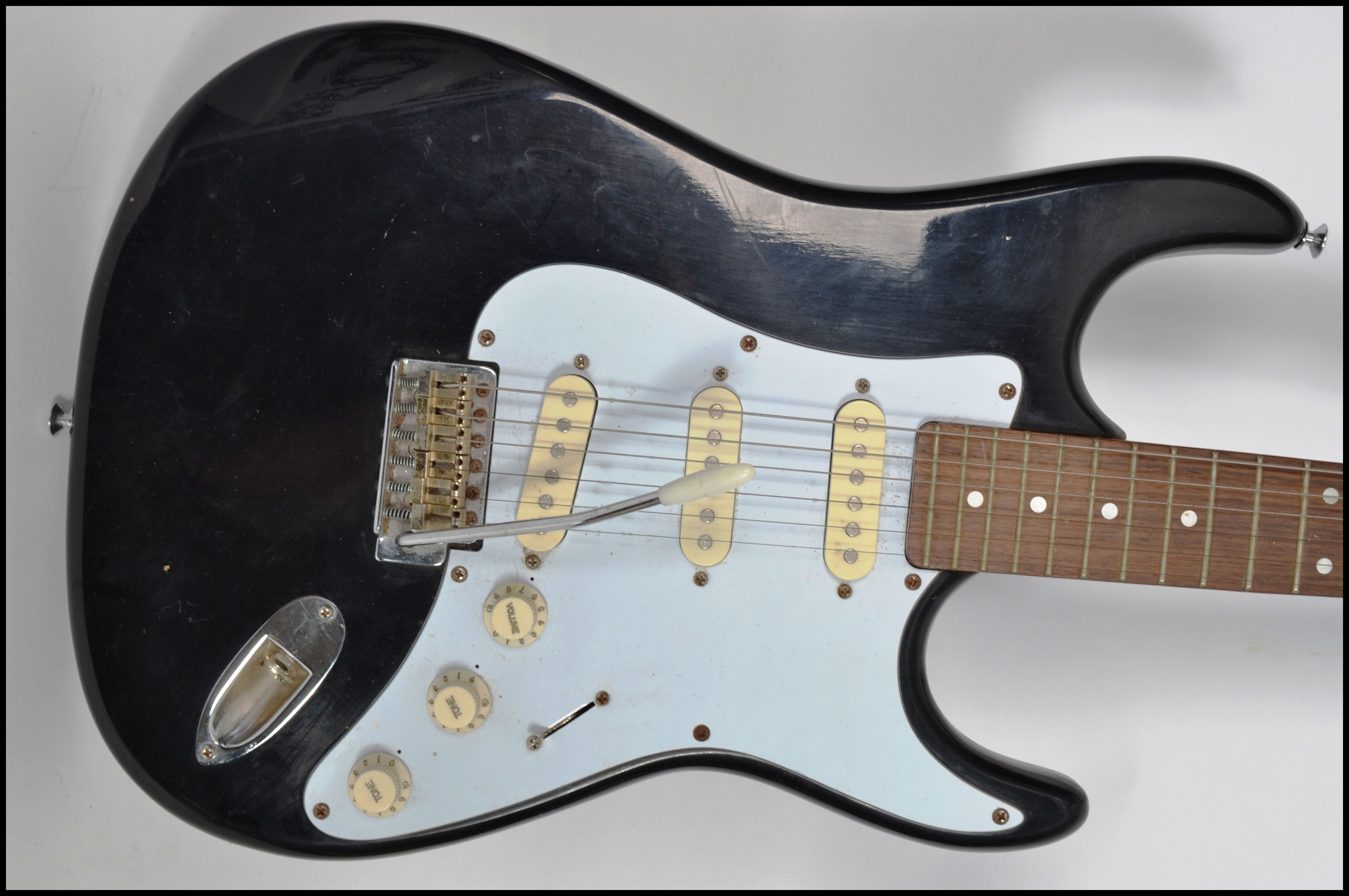 A vintage six sting electric guitar by Encore Coaster having a ...