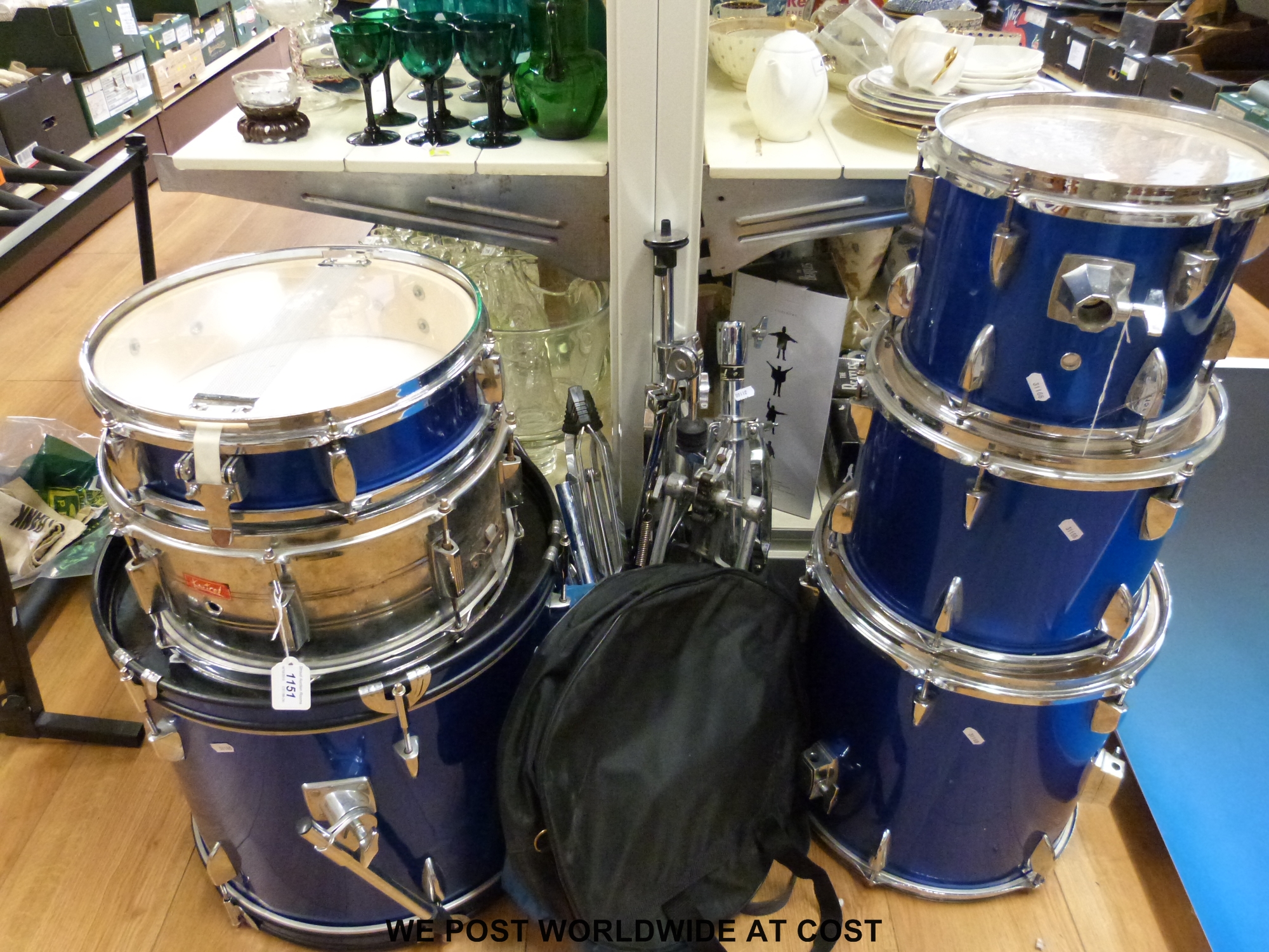 A Pulse drum kit in blue lacquered finish together with 16" UFIP cymbal ...