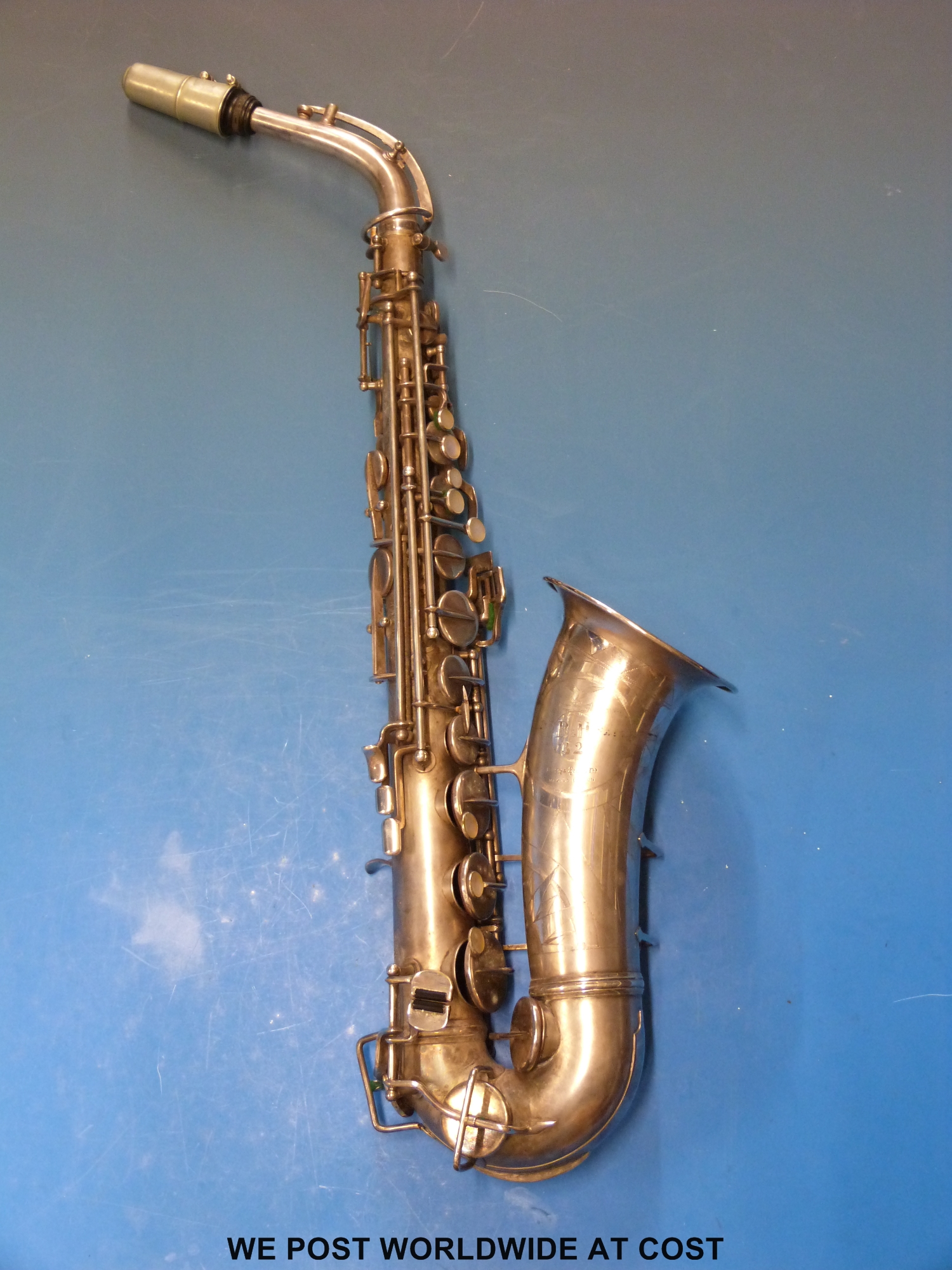 A Boosey and Hawkes "32" cased saxophone